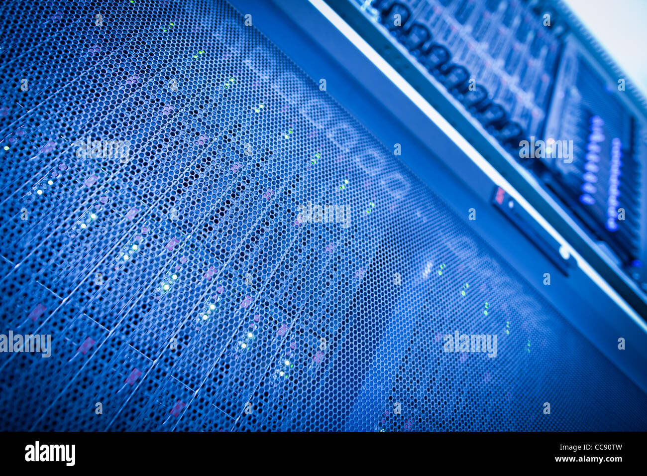 Server rack cluster in a data center (shallow DOF; color toned image ...