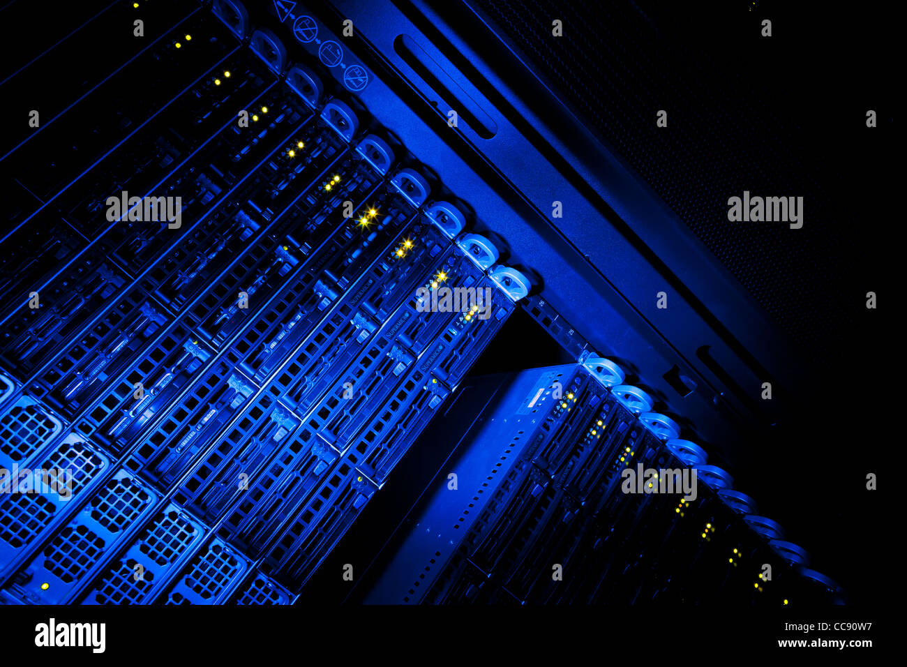 Server rack cluster in a data center (shallow DOF; color toned image ...