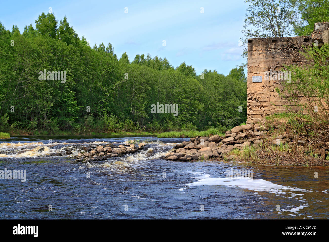 aging destroyed dam on small river Stock Photo - Alamy