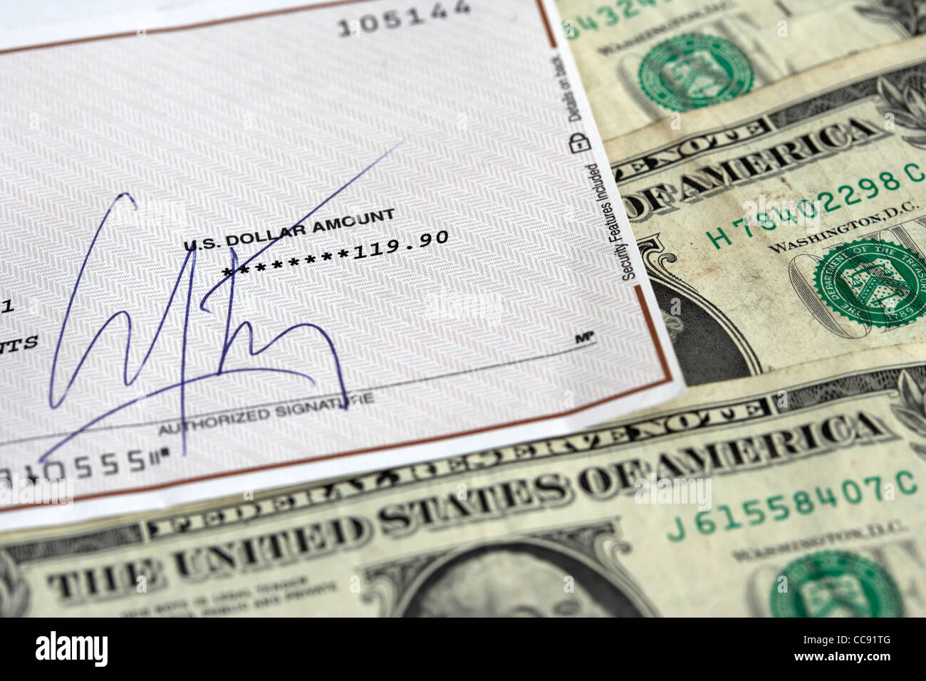 us dollar cheque issued as payment with dollar amount and signature on ...