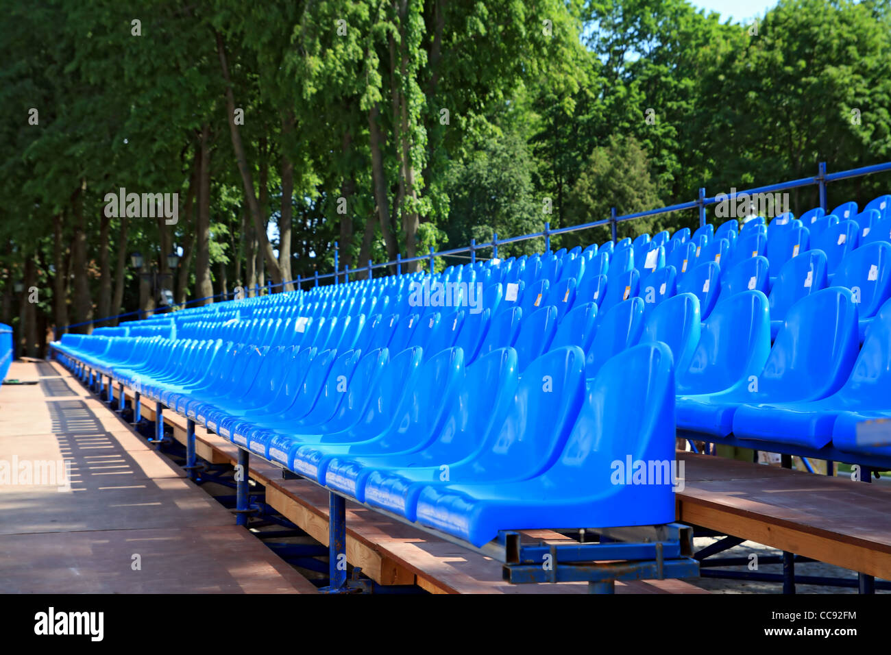 blue easy chairs on stadium Stock Photo - Alamy