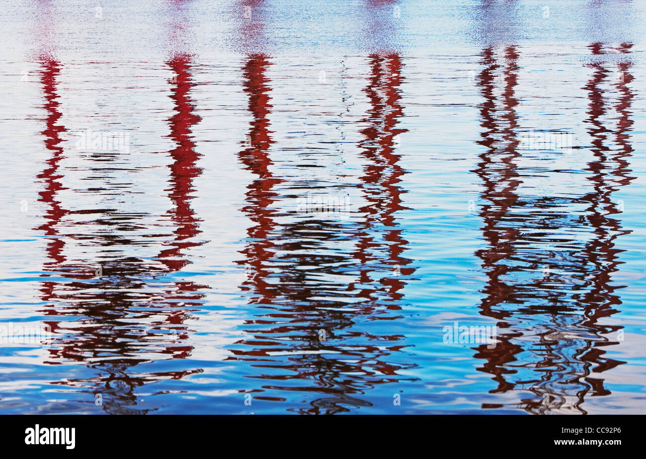 reflection of posts in canal water Stock Photo - Alamy