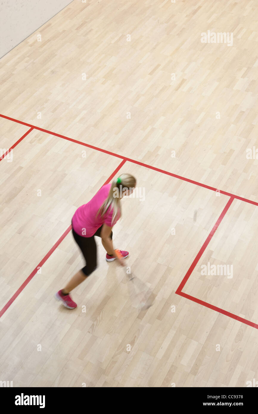 Two female squash players on a squash court Stock Photo - Alamy