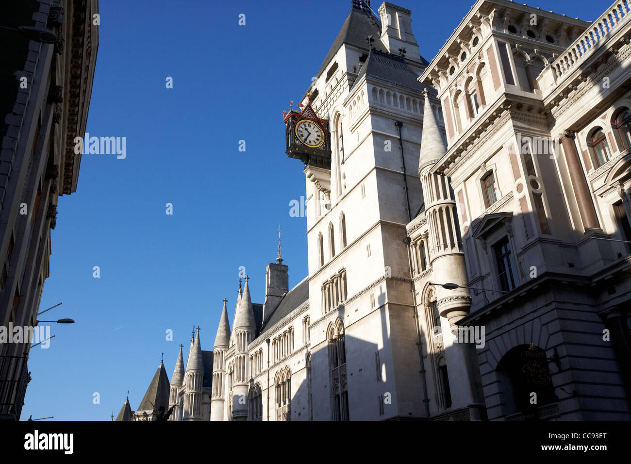 clock on the clock tower of the royal courts of justice building London ...