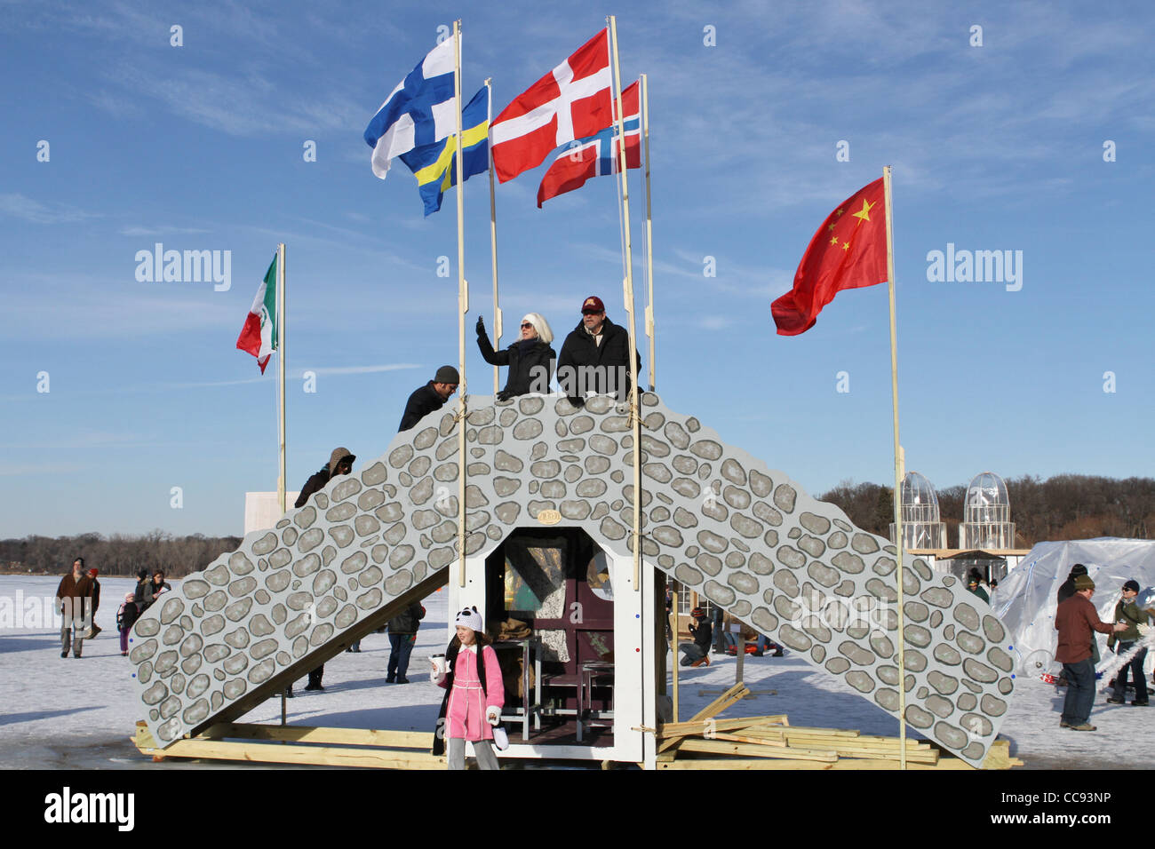People on a bridge at the Art Shanty Projects in Minneapolis, Minnesota ...