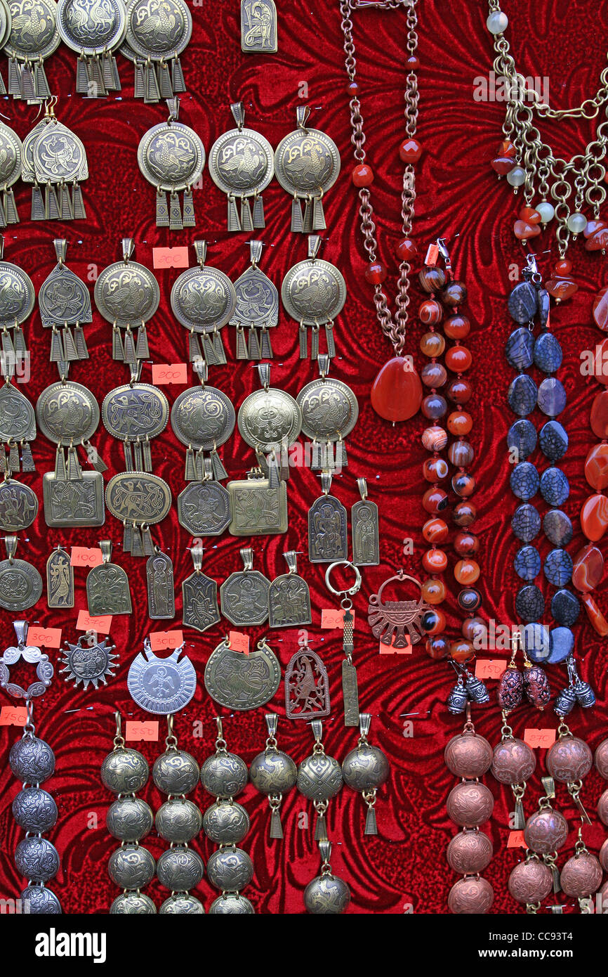 homemade valuables on red background Stock Photo - Alamy