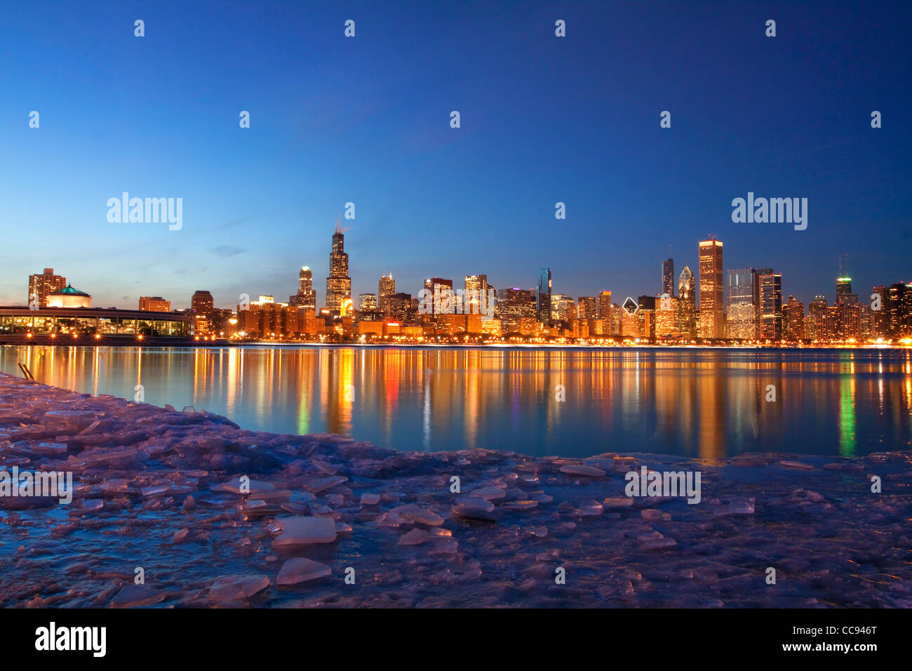 Chicago skyline at twilight in winter with a reflection as seen from ...
