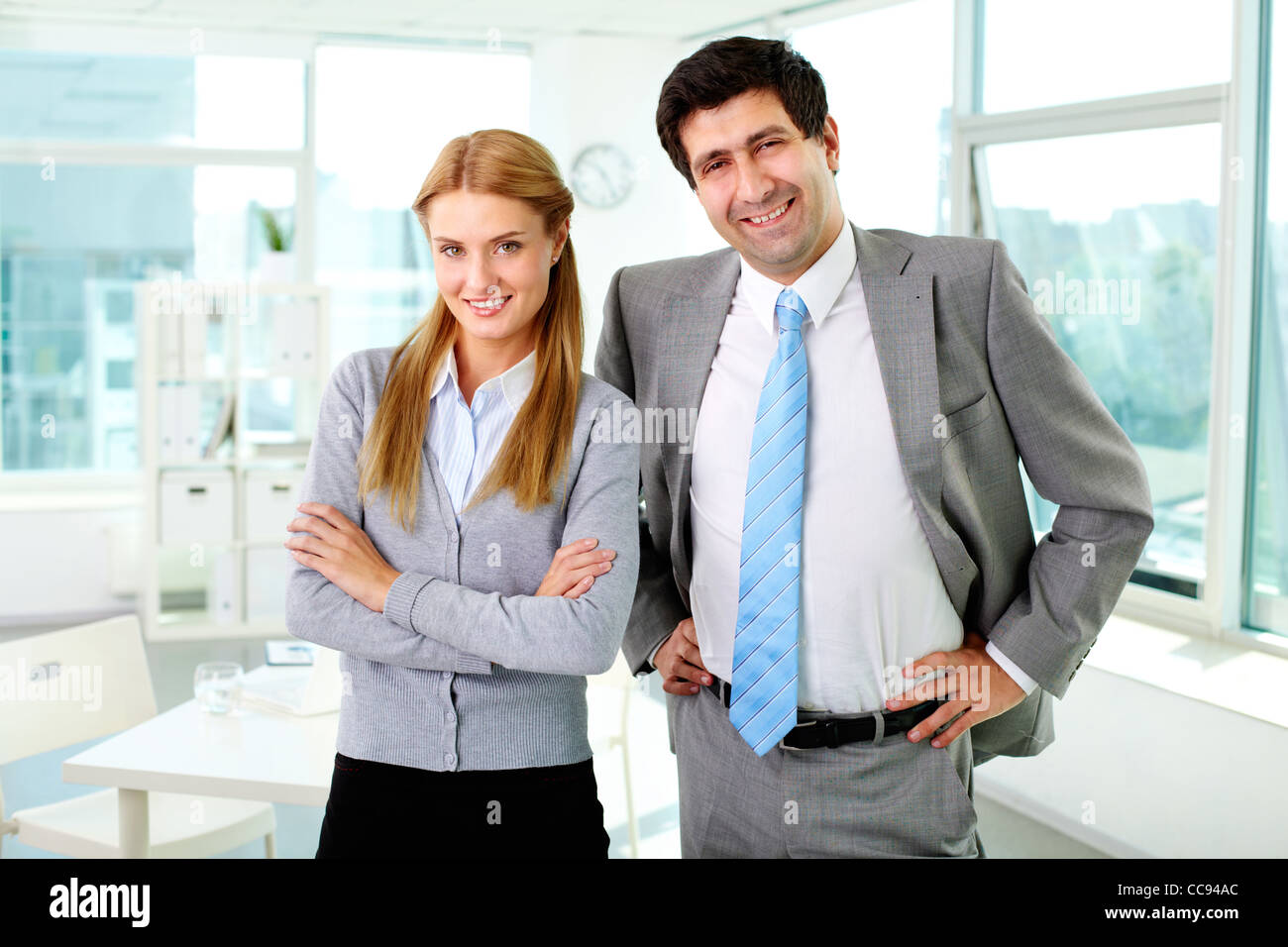 Two business partners posing in hi-res stock photography and images - Alamy