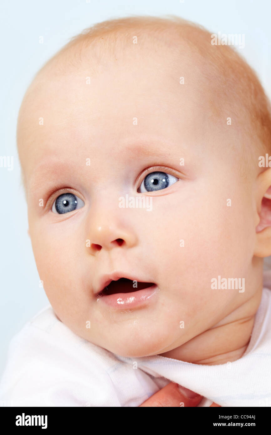 Portrait of cute child looking attentively at something Stock Photo - Alamy