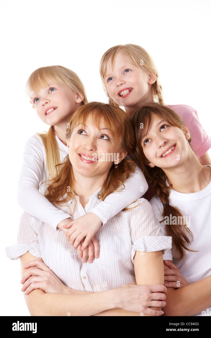 A young family of four over white background Stock Photo - Alamy
