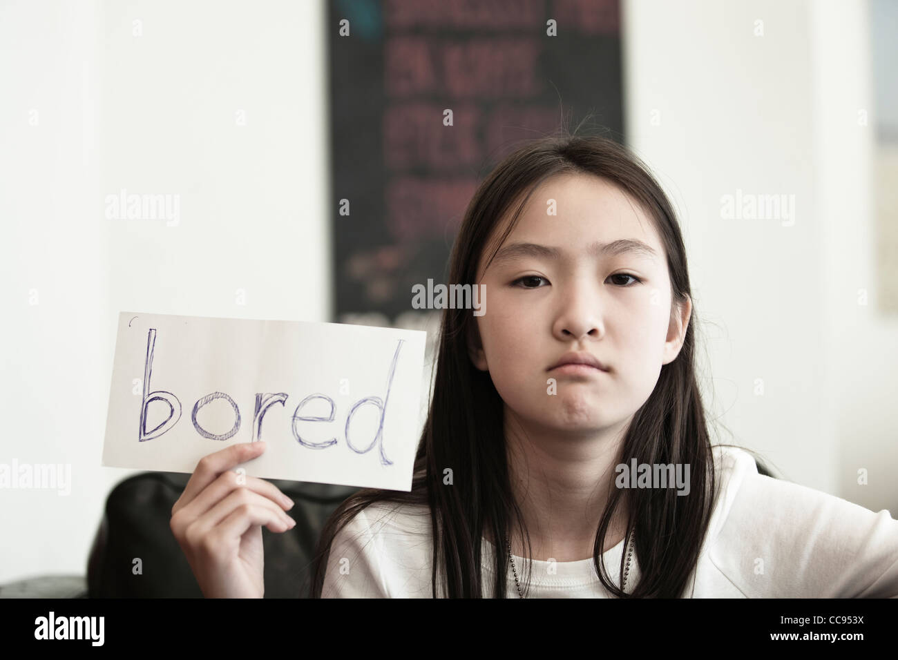 Asian girl holding a sign Stock Photo - Alamy