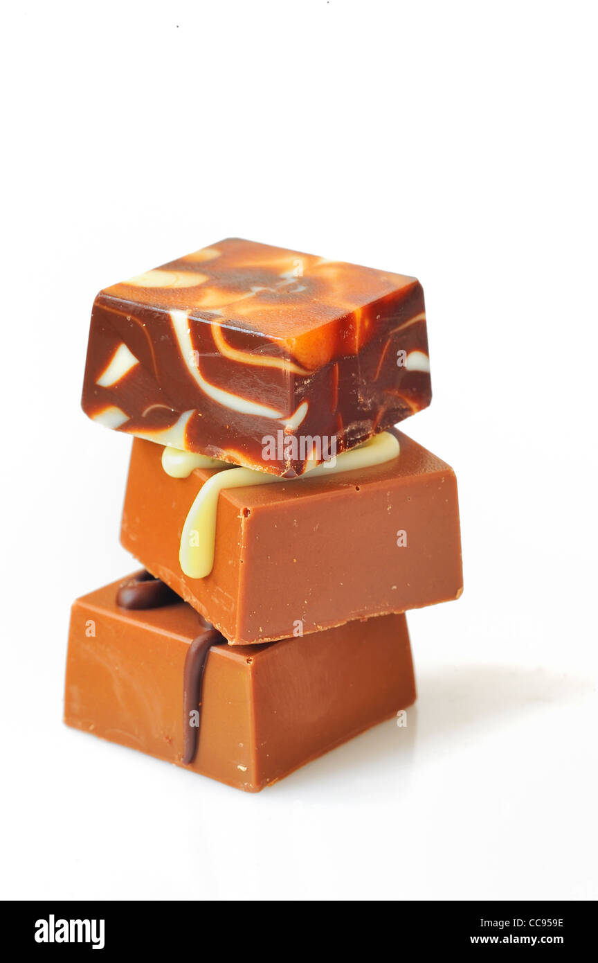 Chocolate candy stacked Stock Photo - Alamy