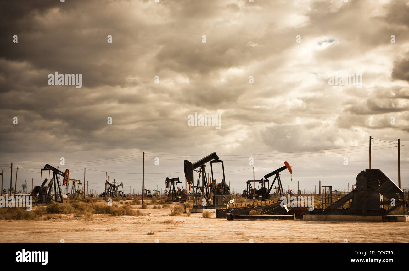 Oil Field in Desert Stock Photo - Alamy