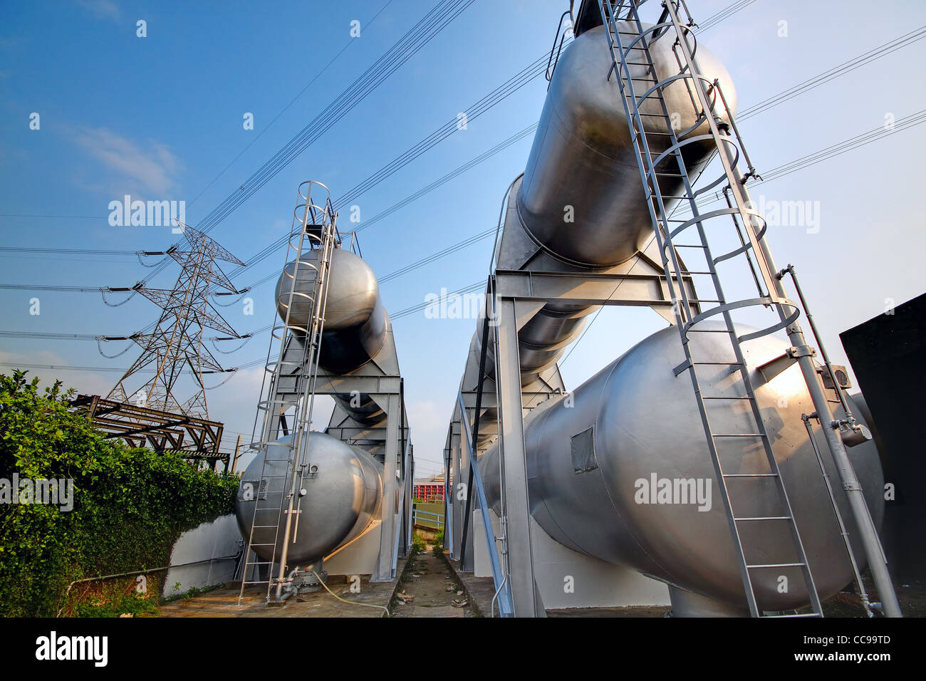 gas container and power tower Stock Photo - Alamy