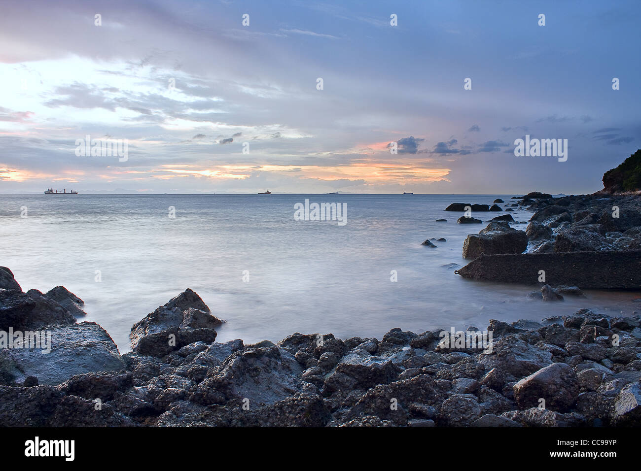 sunset shingle coast in hong kong Stock Photo - Alamy