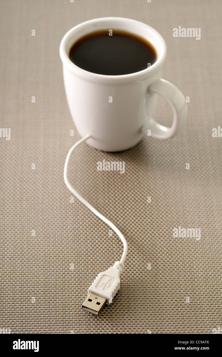 USB Plugged into Coffee Cup Stock Photo - Alamy