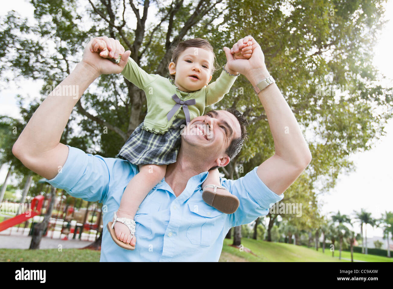 Father with Daughter on Shoulders Stock Photo - Alamy