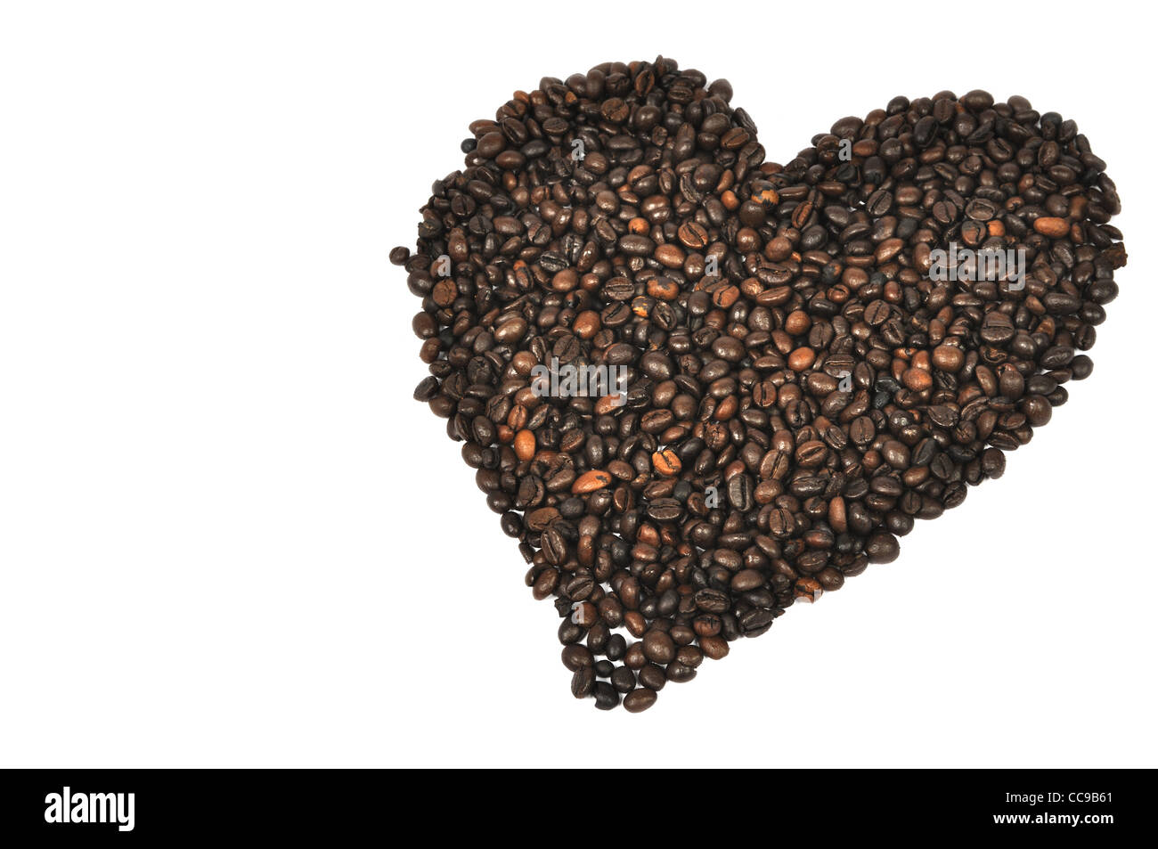 Shape of heart made with coffee beans on white background Stock Photo ...