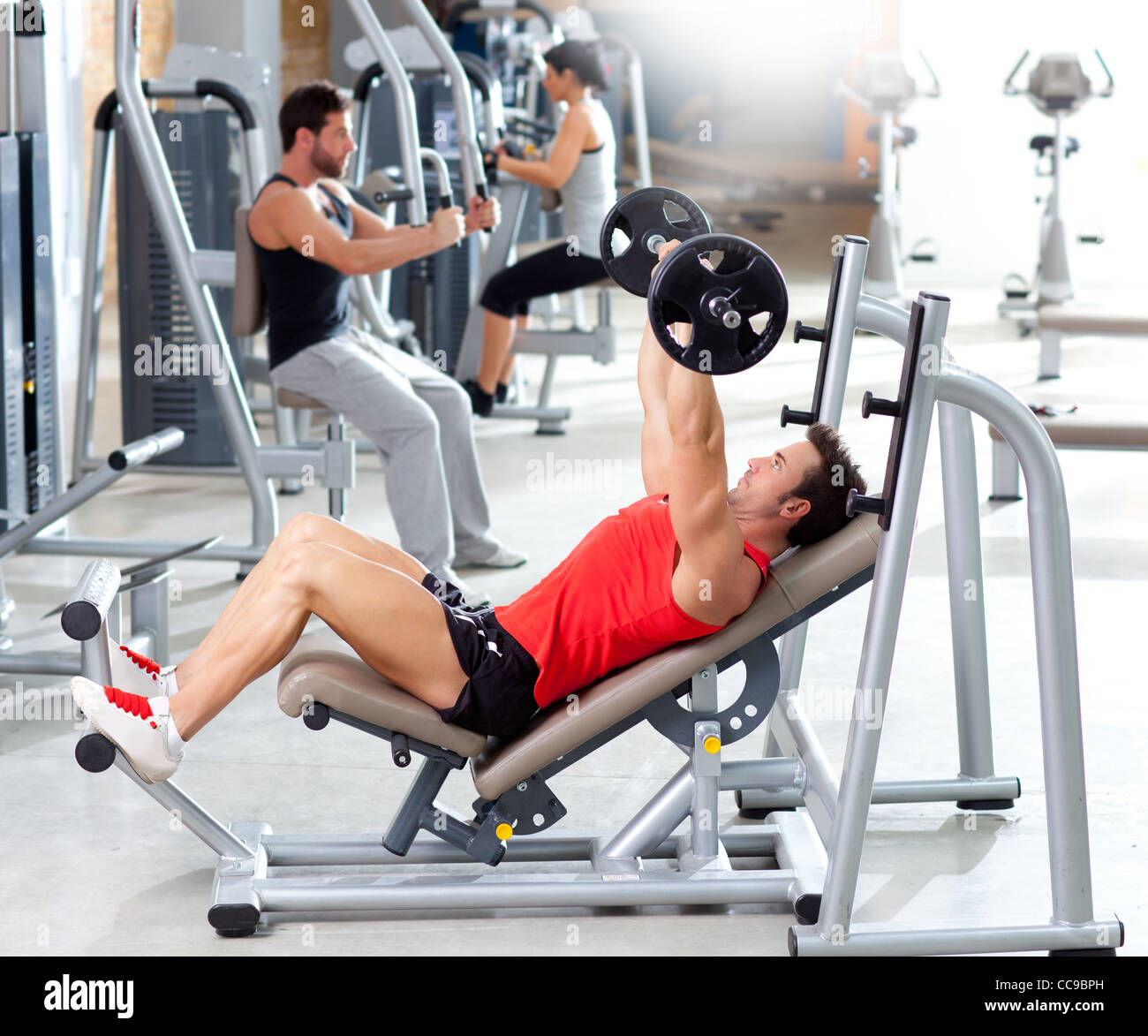 group with weight training equipment on sport gym club Stock Photo - Alamy