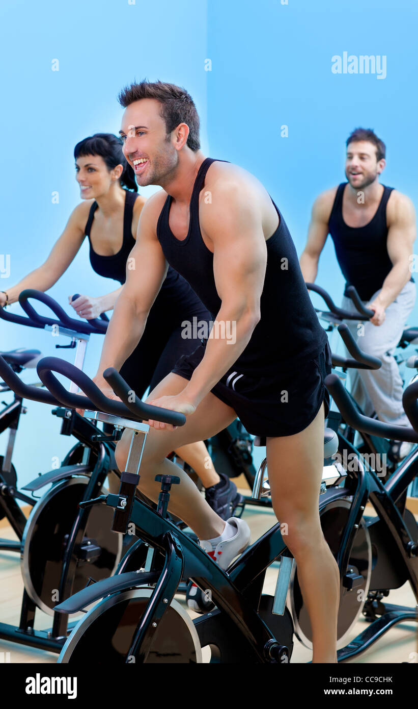 Stationary spinning bicycles fitness man in a gym sport club Stock ...