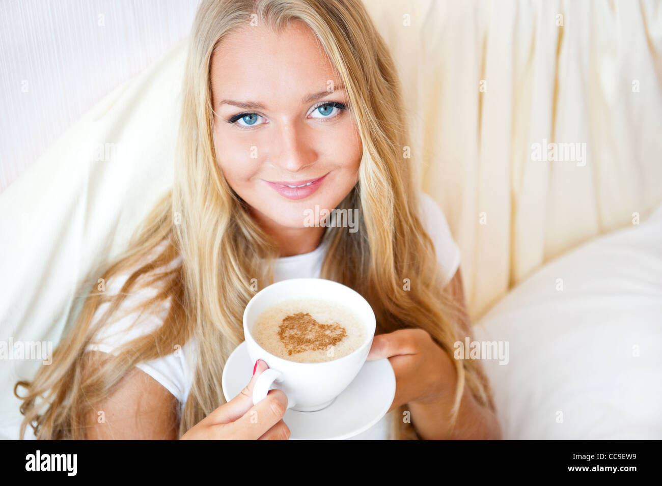 Romantic couple drinking coffee lying hi-res stock photography and ...