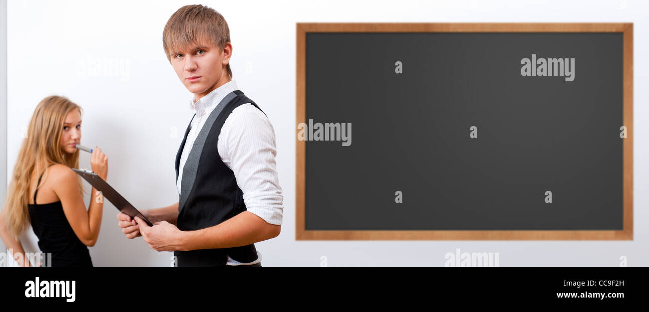 Two students - girl and boy making presentation at classroom Stock ...