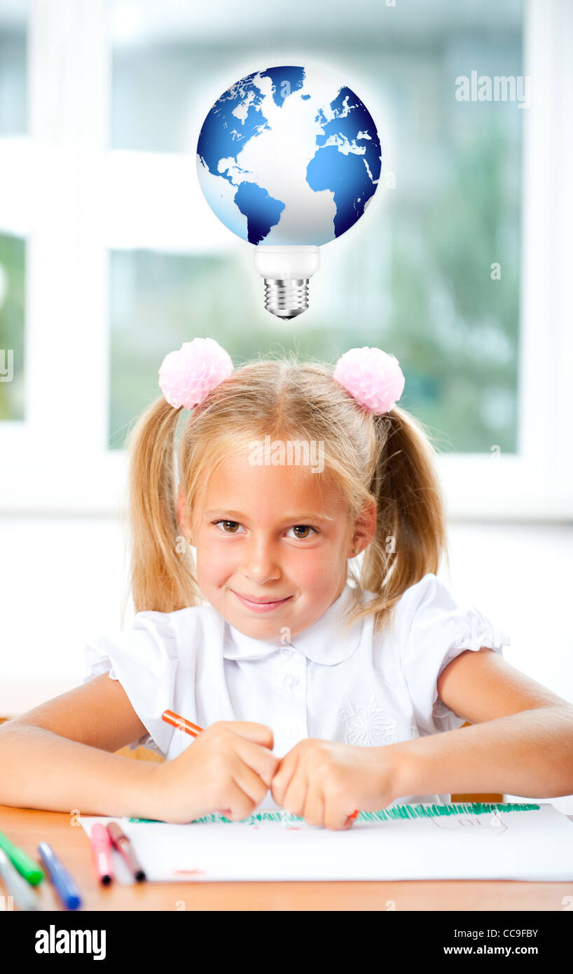 Little girl looking for a drawing concept wile painting picture on ...