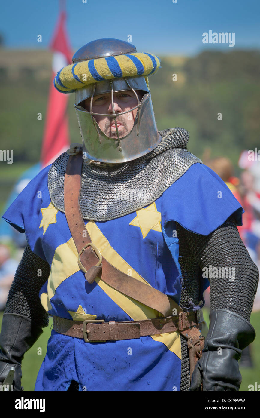 Blue Knight, wearing helmet and sticking tongue out Stock Photo - Alamy
