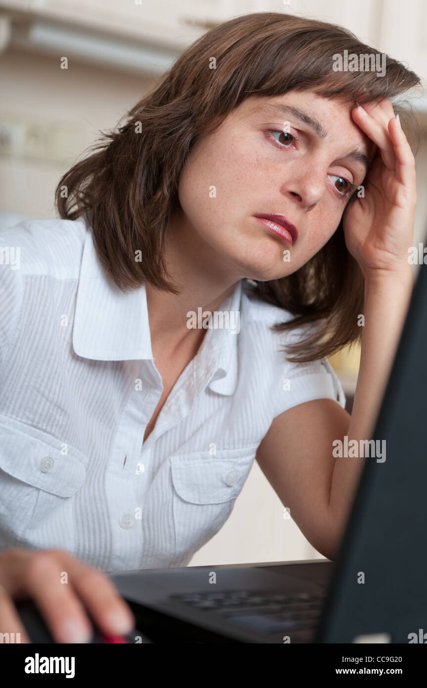 Depressed and tired business person at work Stock Photo - Alamy