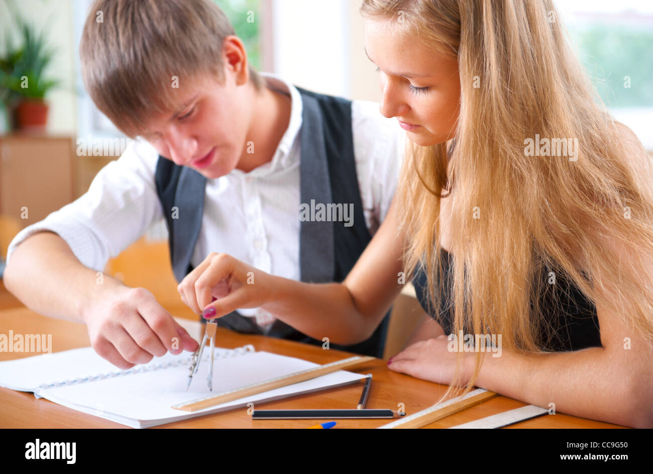 Portrait of college students working indoors looking happy Stock Photo ...