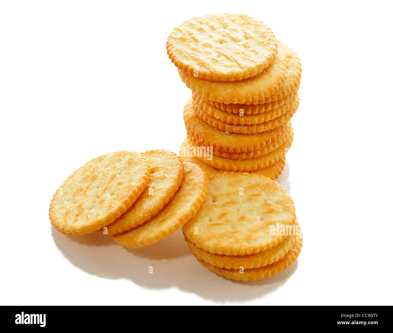 a stack of crackers on white background Stock Photo - Alamy