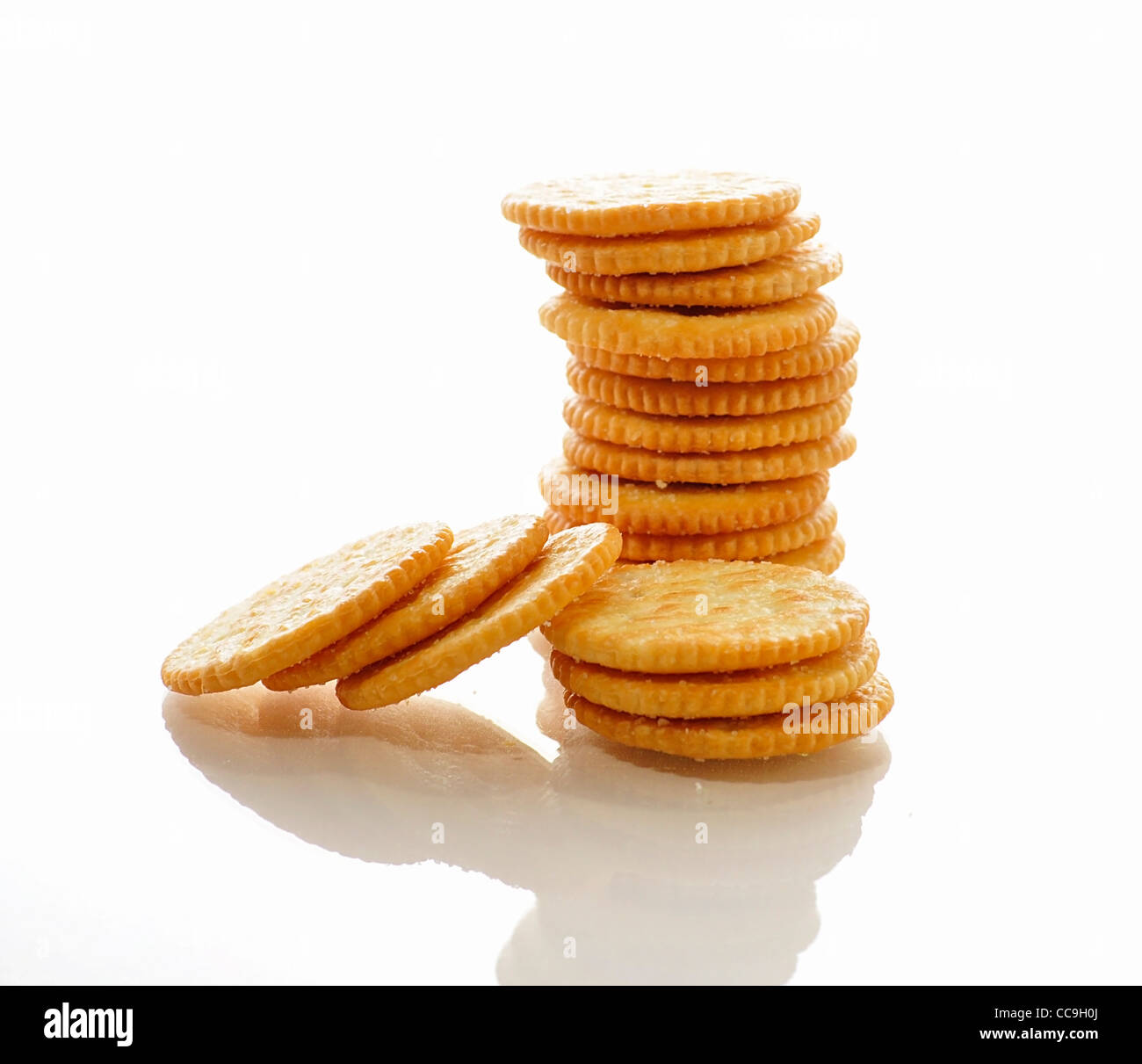 a stack of crackers on white background Stock Photo - Alamy