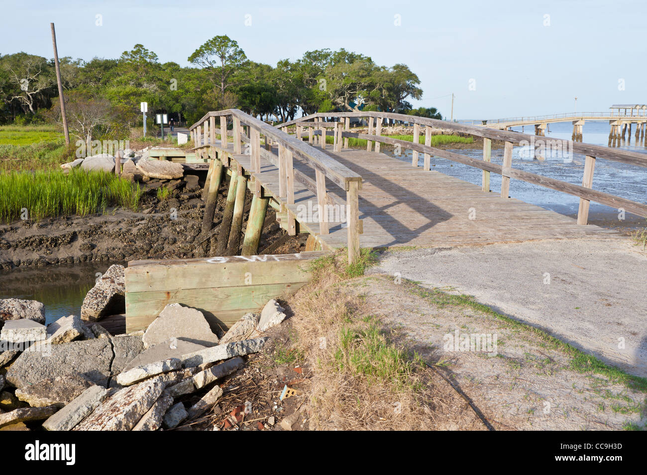 Wooden pedestrian bridge over Clam Creek marks entrance to Driftwood ...