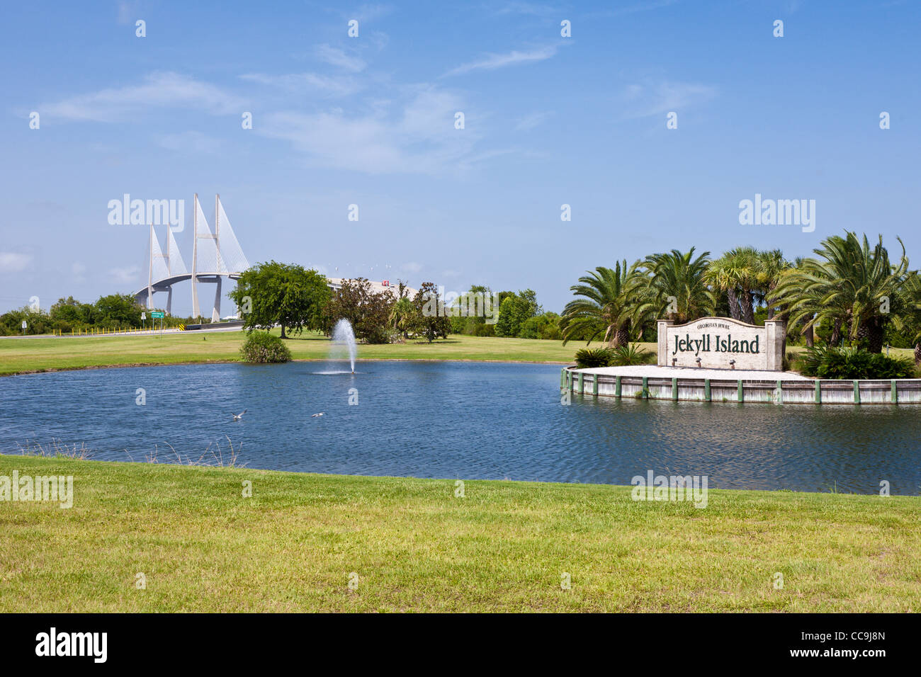 Sidney Lanier Bridge behind then welcome sign at the entrance to Jekyll ...