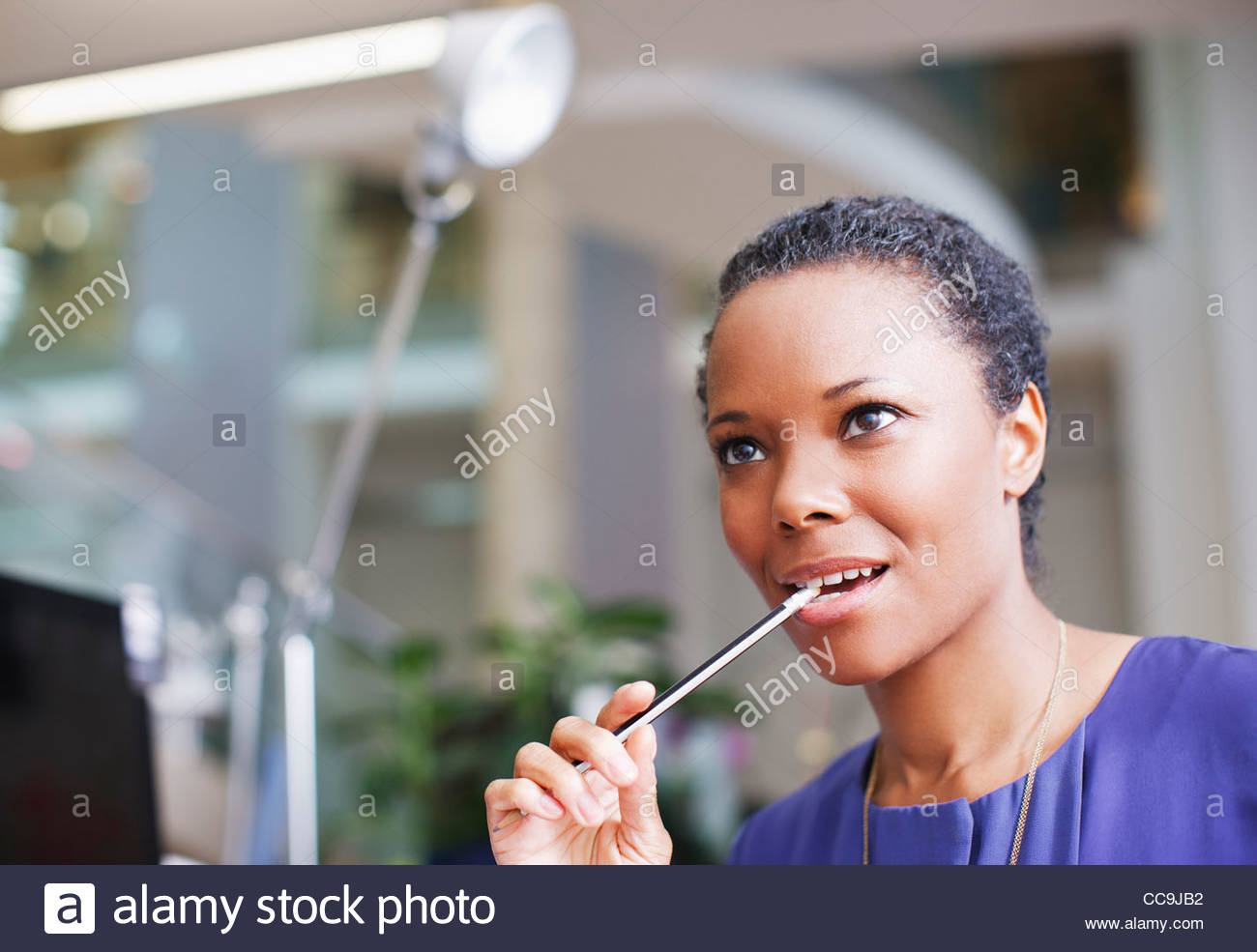 Biting Pen Stock Photos & Biting Pen Stock Images - Alamy