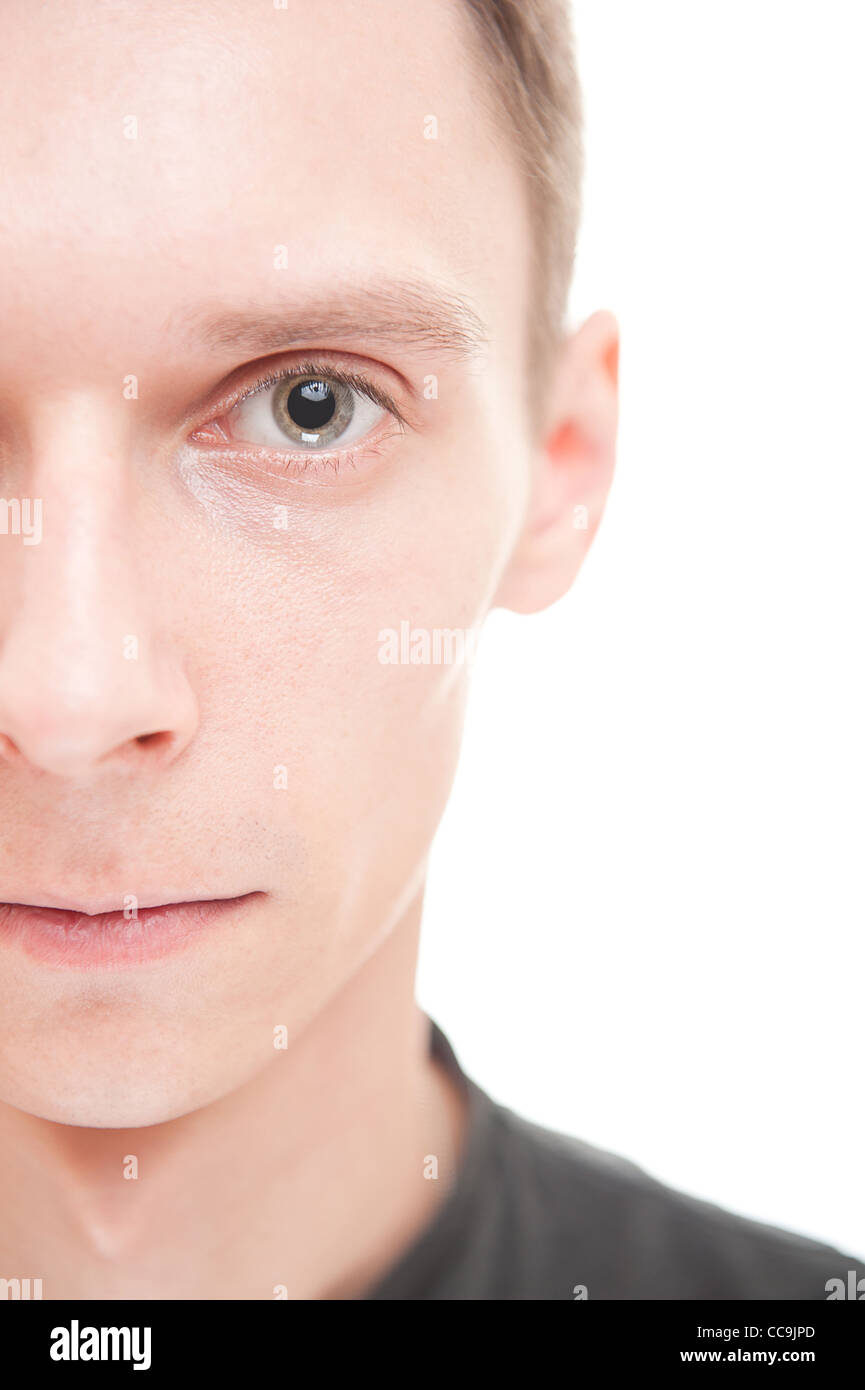 Closeup Portrait of serious young man looking at camera Stock Photo - Alamy