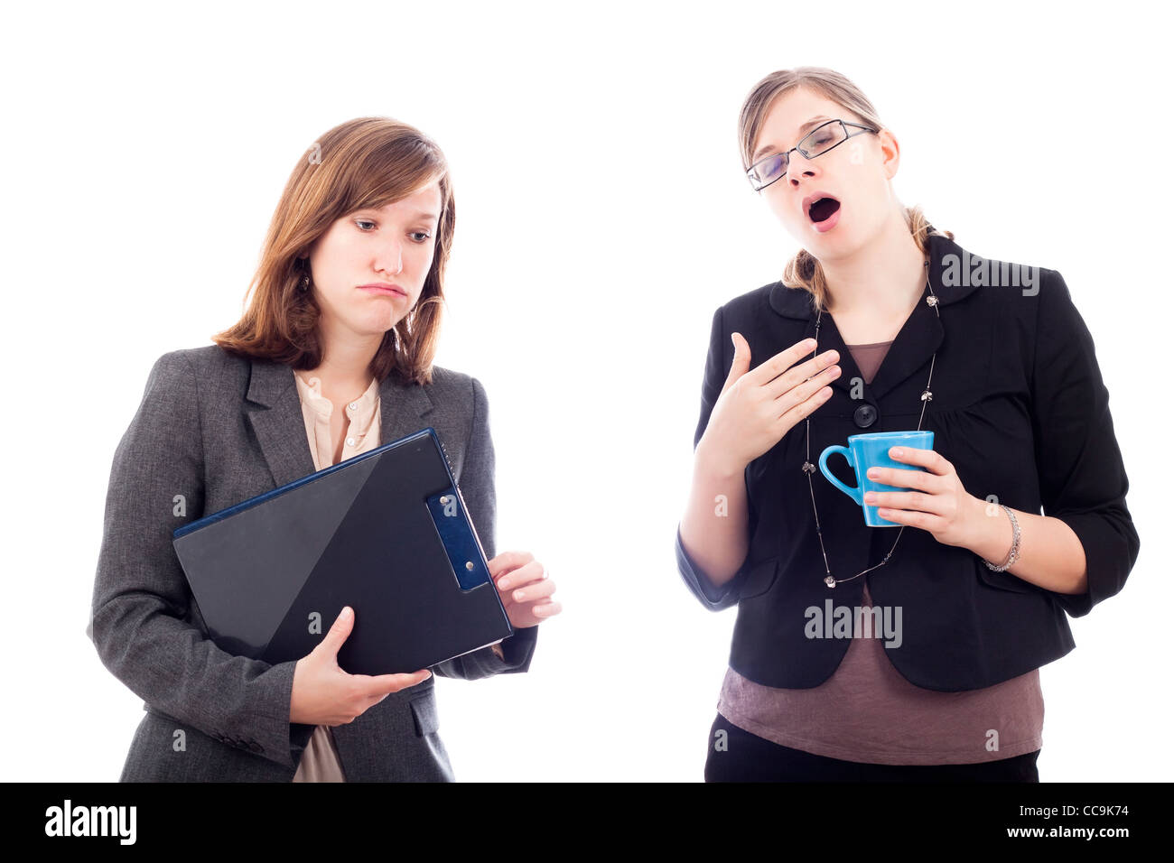 Two tired overworked business women, isolated on white background Stock ...