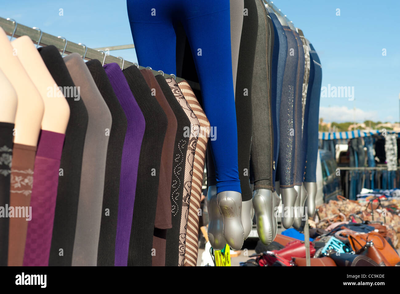 Street market stall with colorful tights and stocking on display Stock ...