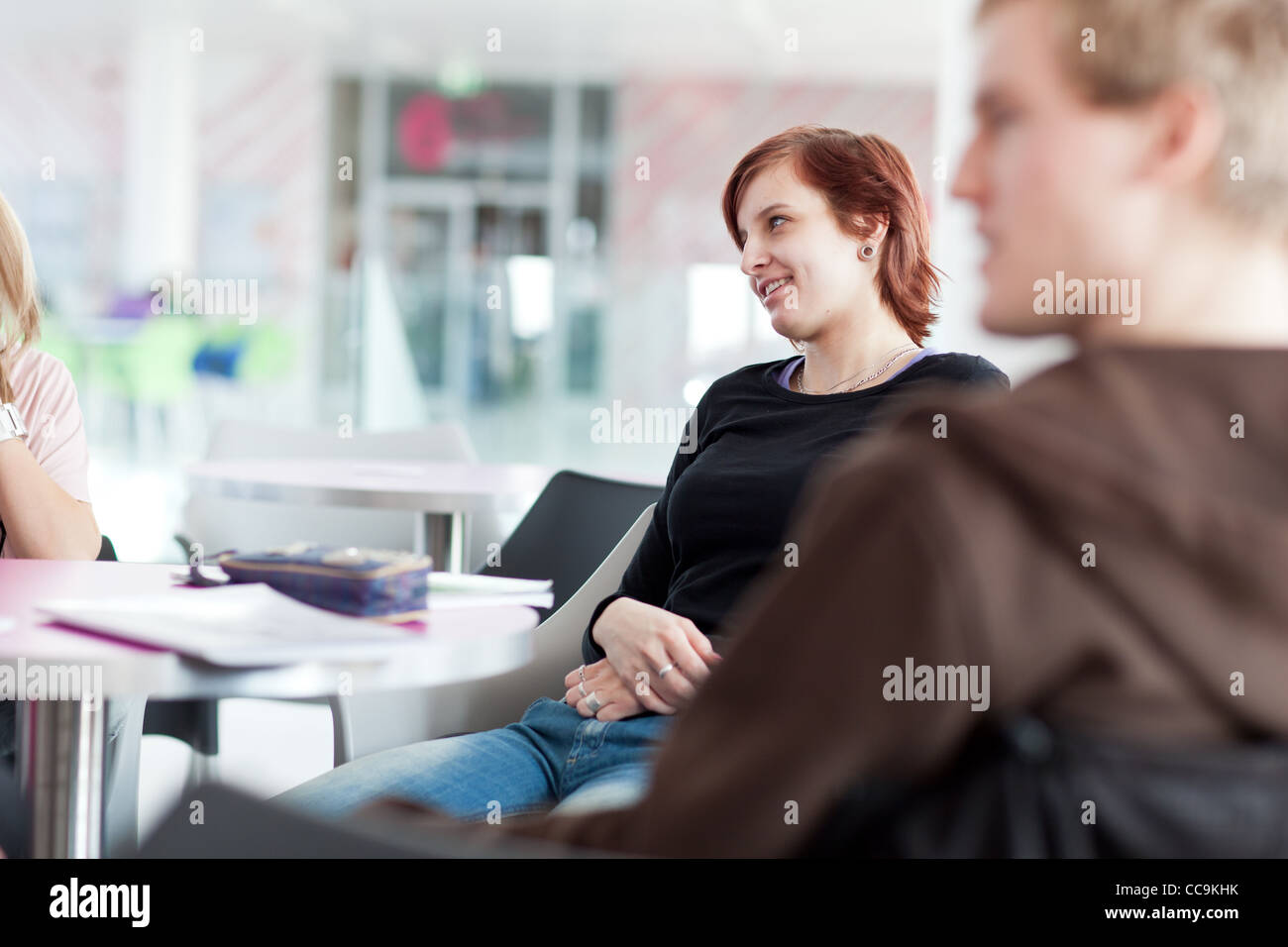 Group of college/university students during a brake Stock Photo - Alamy