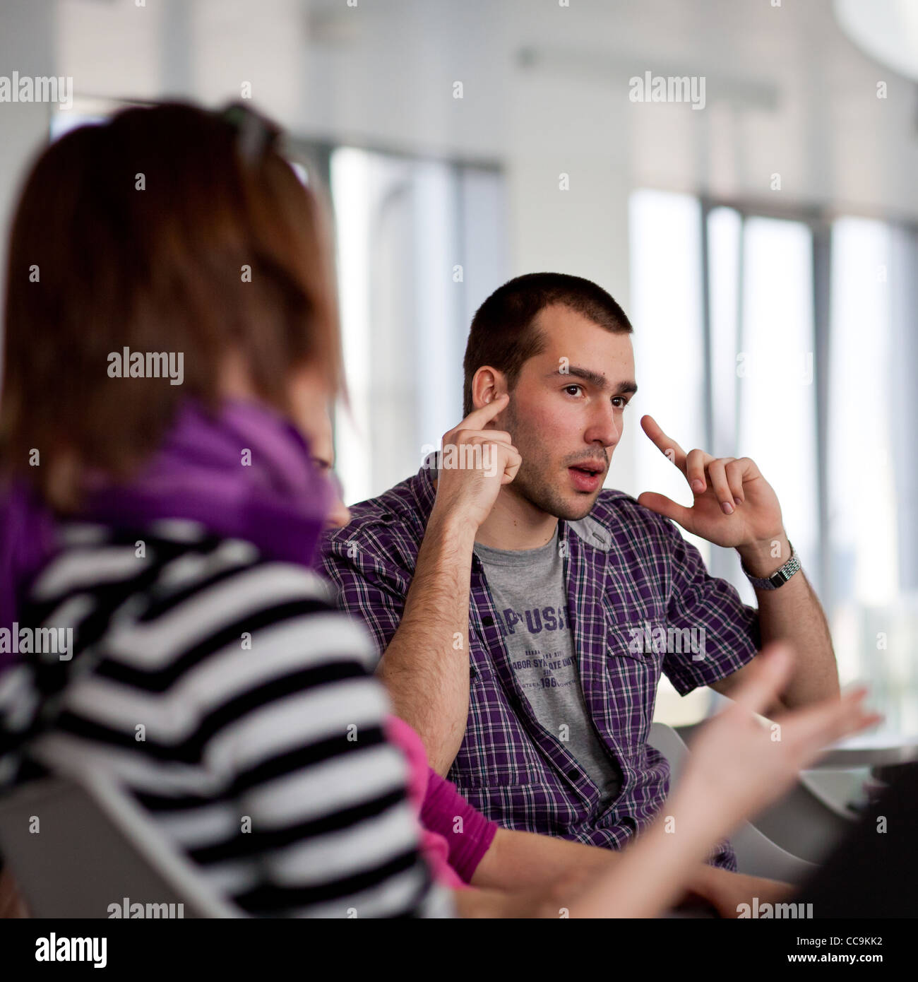 Group of college/university students during a brake Stock Photo - Alamy