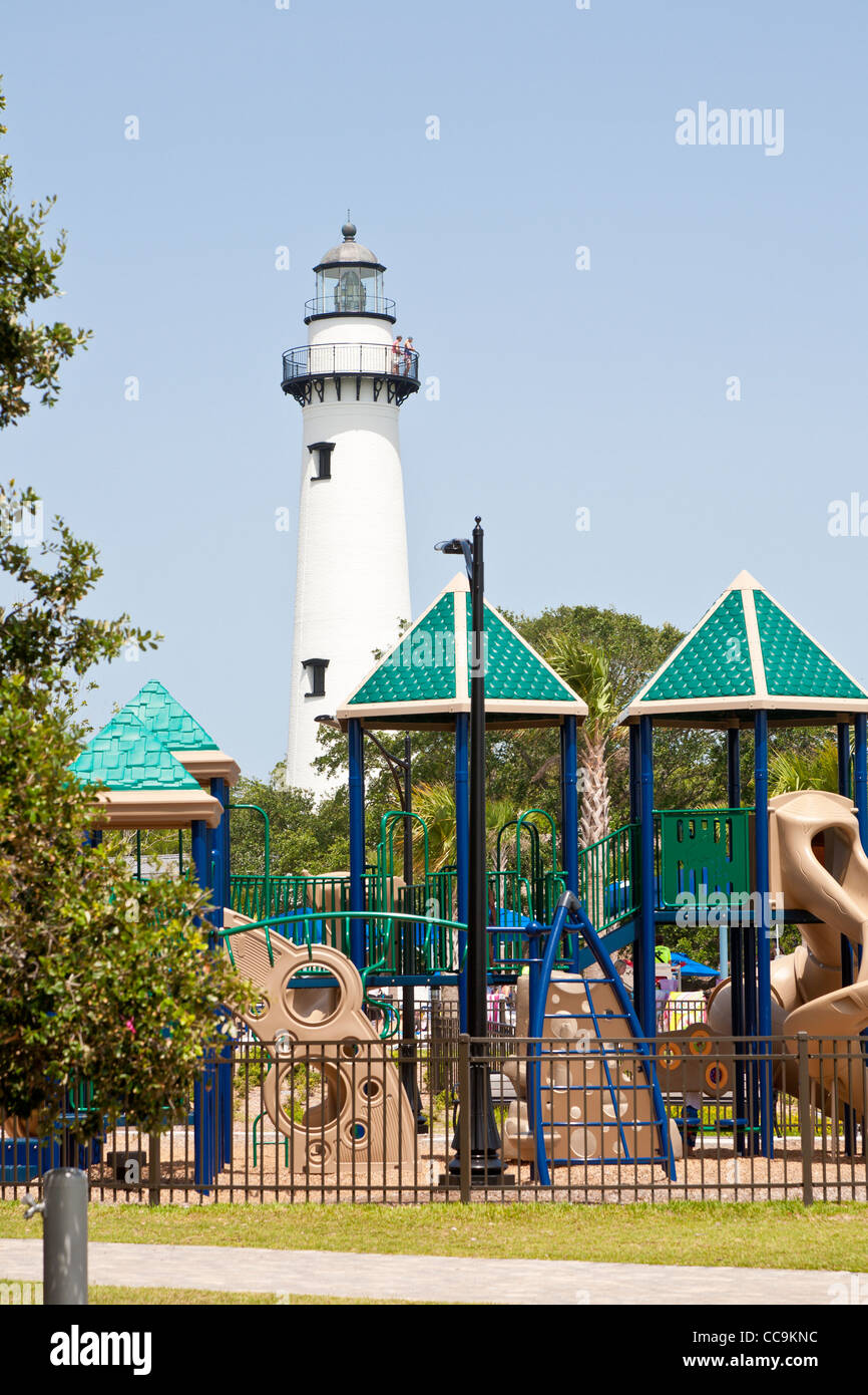 St. Simons Lighthouse rises behind Neptune Park in St. Simons Island ...