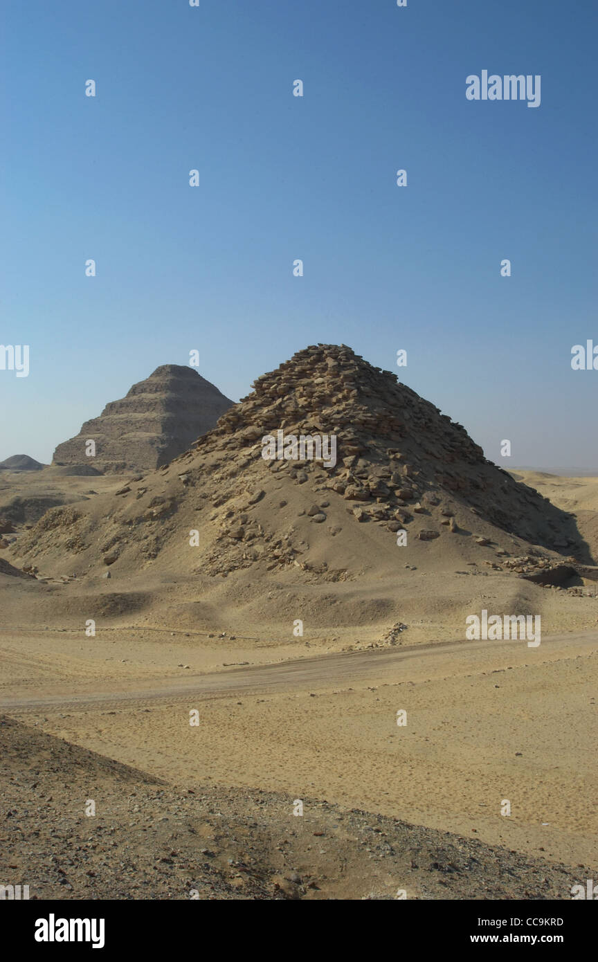 Pyramid of Userkaf. At background, Djoser Pyramid. Old kingdom. Saqqara ...