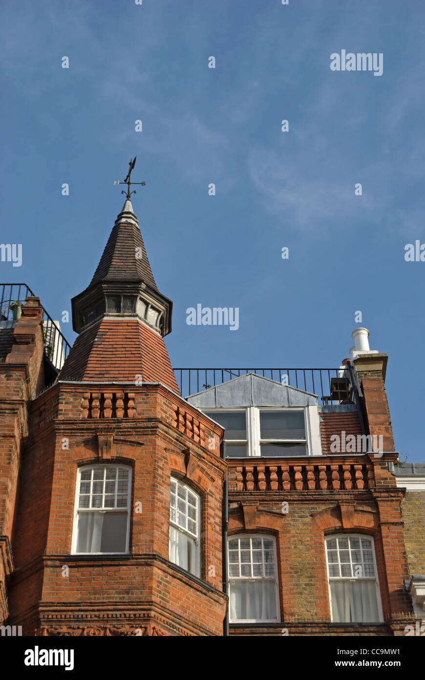 turret on redbrick victorian mansion block, designed by harry bell ...