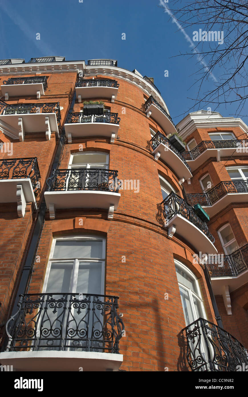 curved end section of a redbrick victorian mansion block on drayton ...