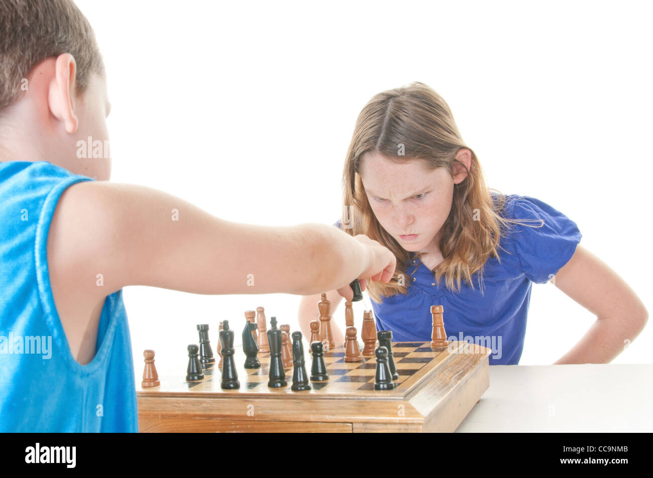 Kids playing game of chess Stock Photo - Alamy