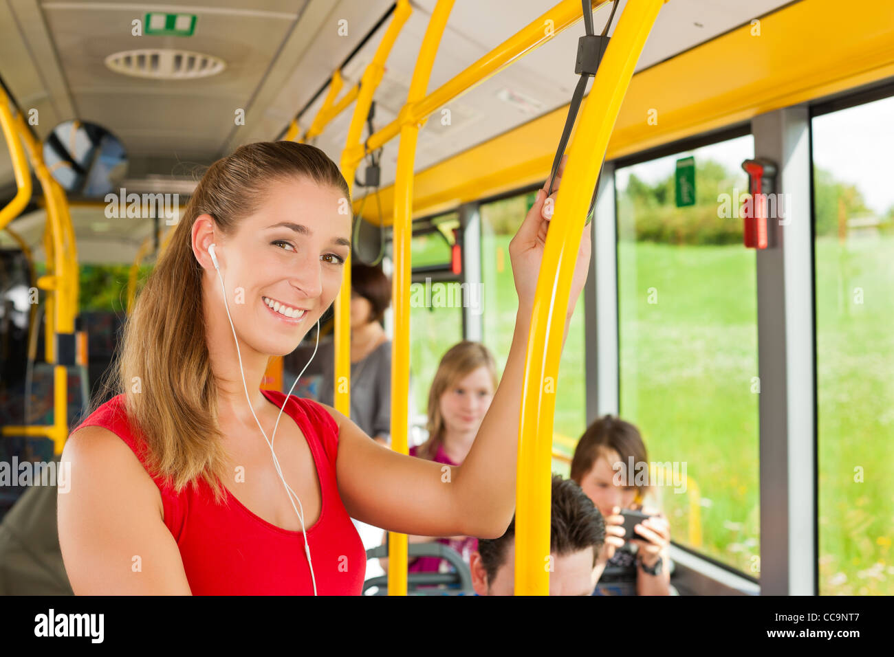 Female passenger in a bus; presumably she is heading home Stock Photo ...