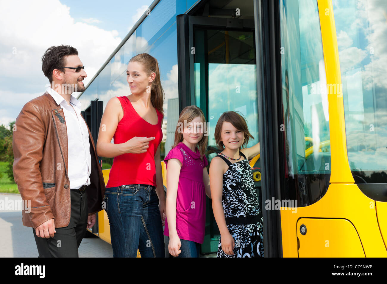 Passengers boarding a bus at a bus station Stock Photo - Alamy