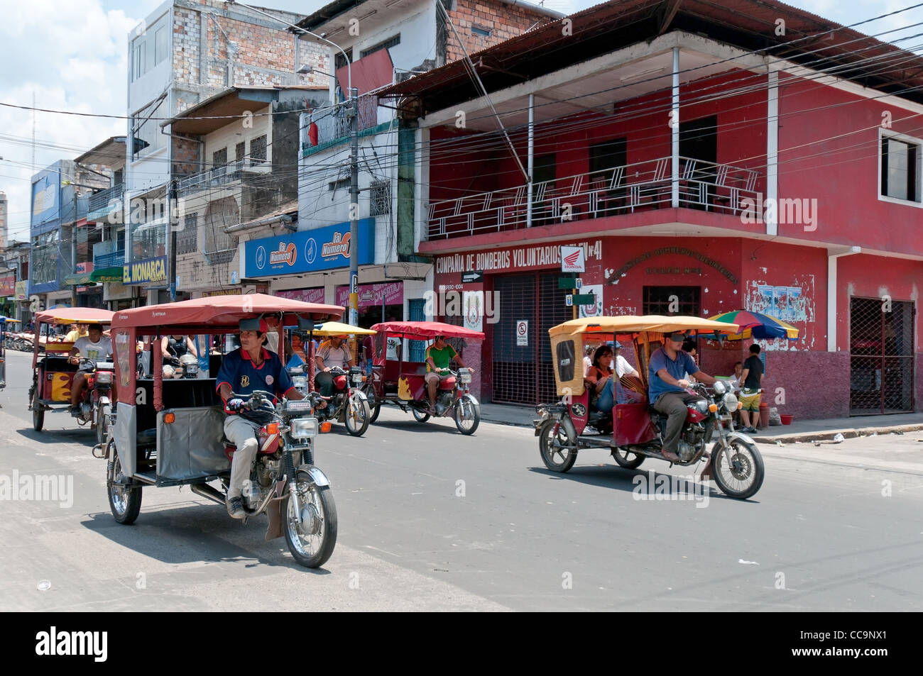 Iquitos, Peru. Motocarros, motokars or auto rickshaws are ubiquitous ...