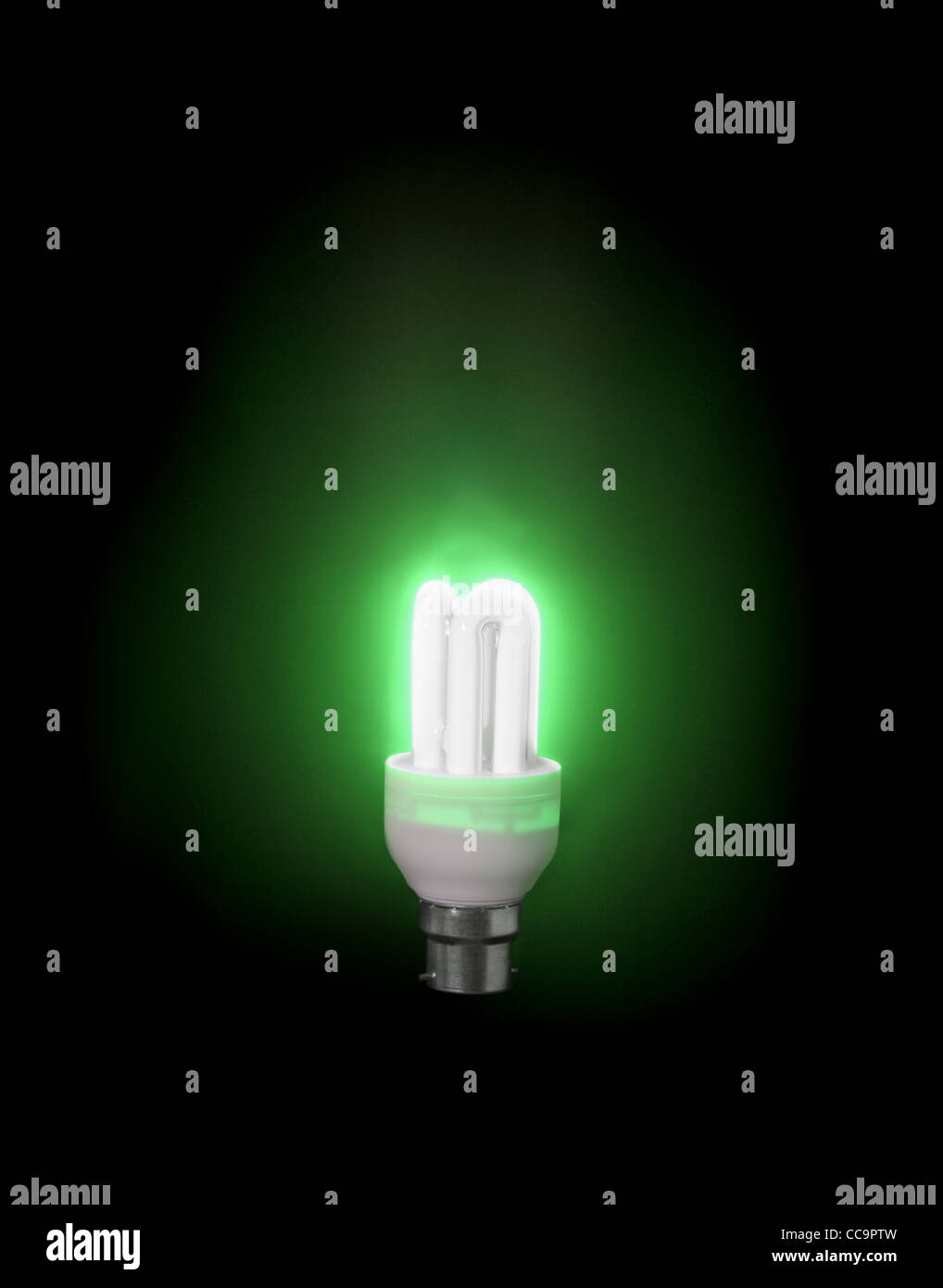 A low energy light bulb with 'green energy' light being emitted Stock ...