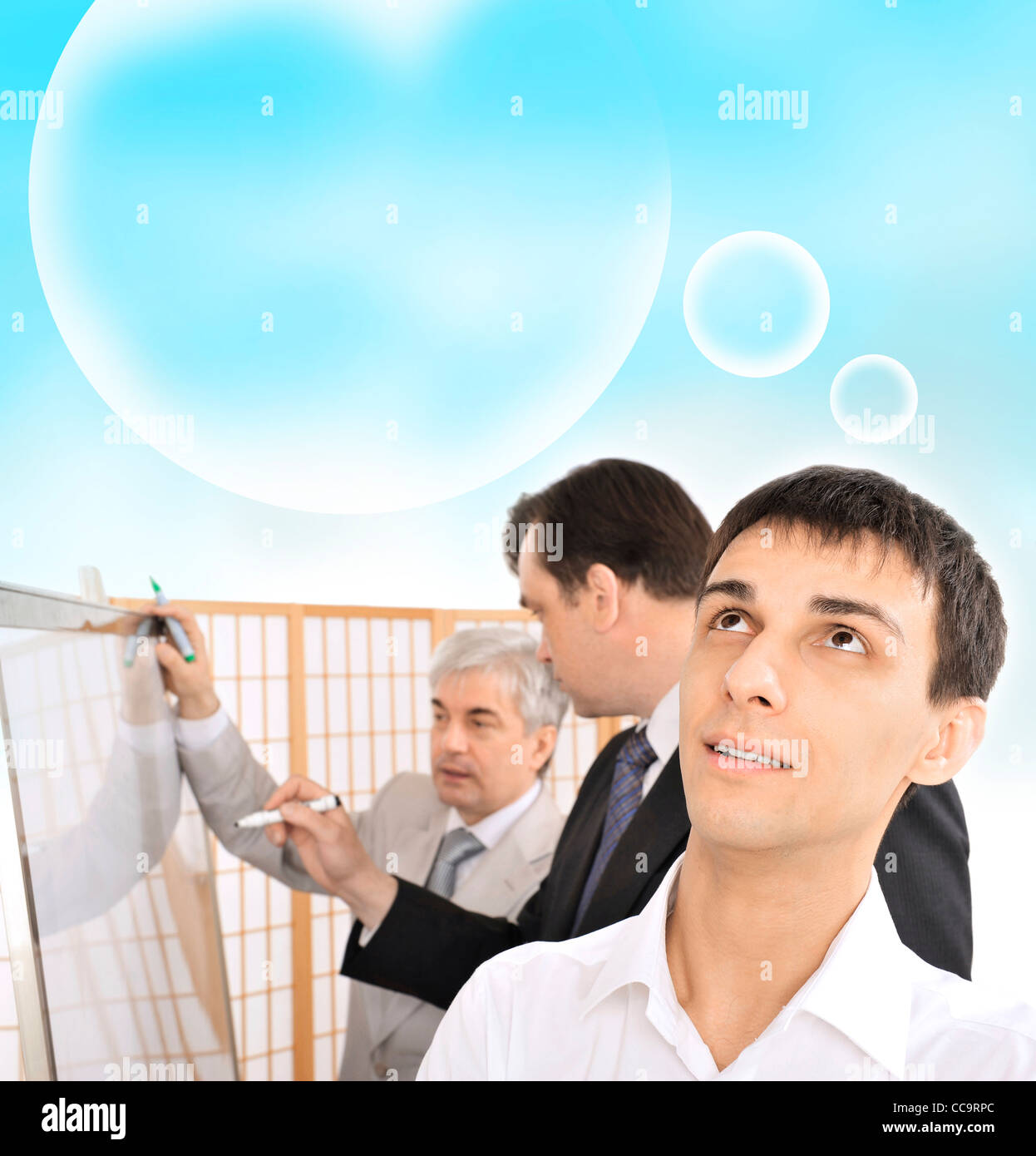 Portrait of a team planning. Office environment Stock Photo - Alamy
